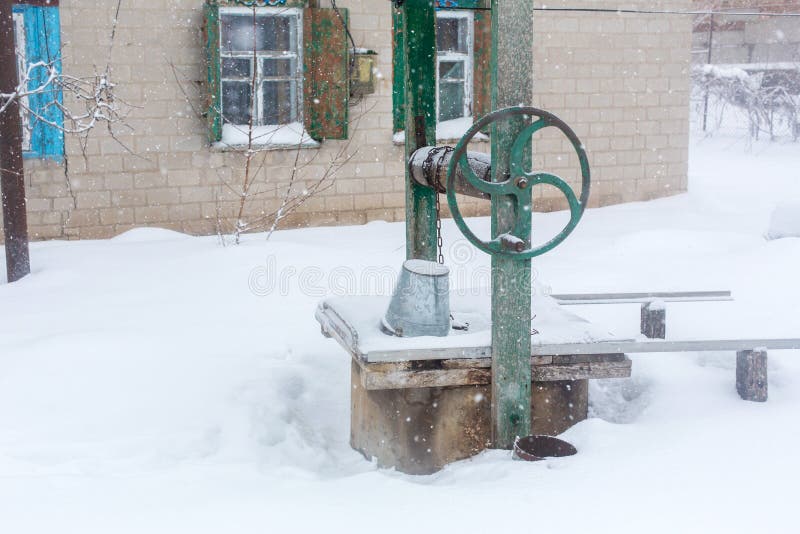 Winter. an Old Water Well is Covered in Snow Stock Image - Image of ...