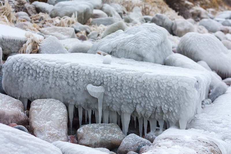 Winter Pattern on the Sea Rocks Stock Photo - Image of light, mountain ...