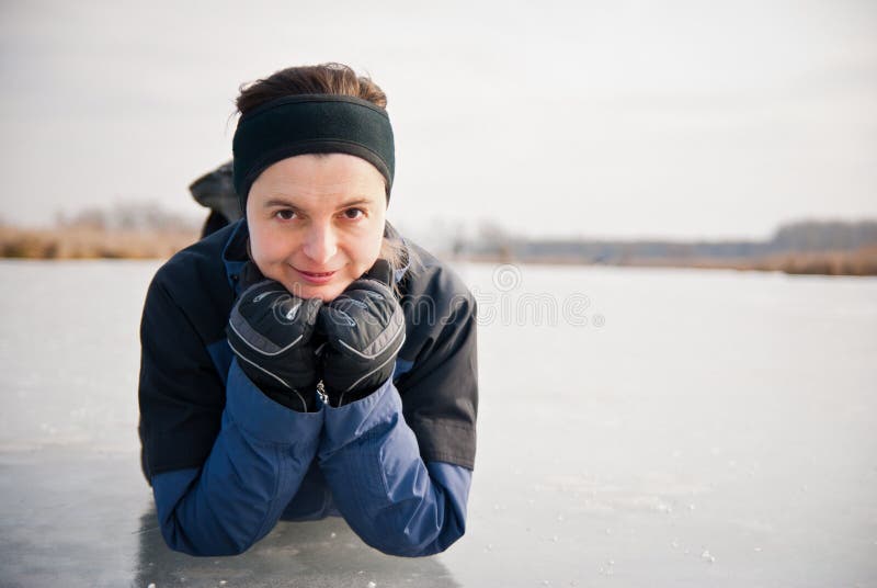 Winter Portrait - Lying on Ice Stock Photo - Image of frozen, winter ...