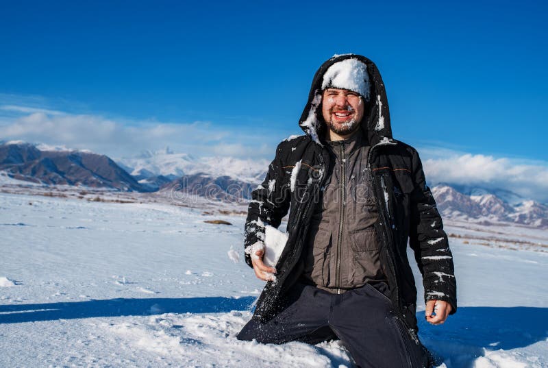 Winter Portrait of Man with Snow on His Face on Mountains Background ...