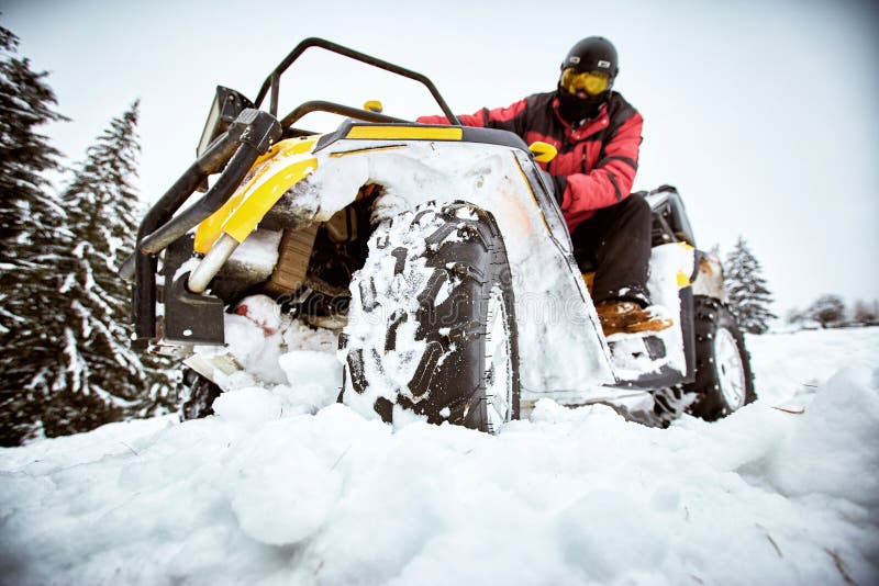 Winter Race On An ATV On Snow In The Forest. Stock Photo - Image of ...