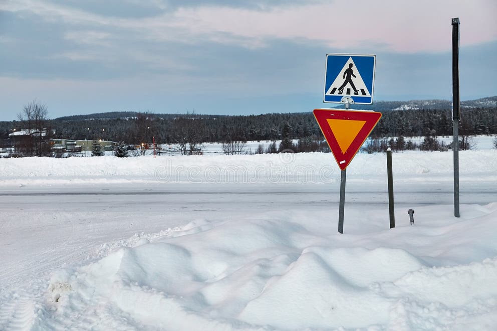 Winter Road Intersection stock image. Image of snow - 130733411