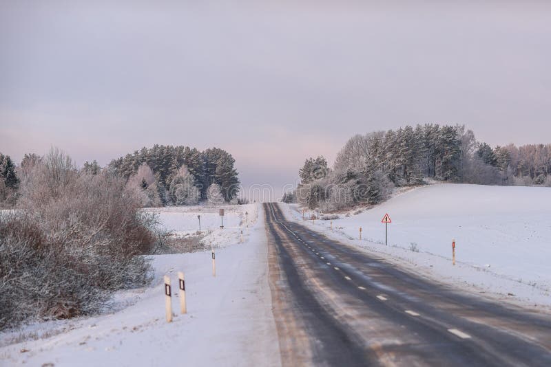 Winter Road in Lithuania stock photo. Image of morning - 82562636