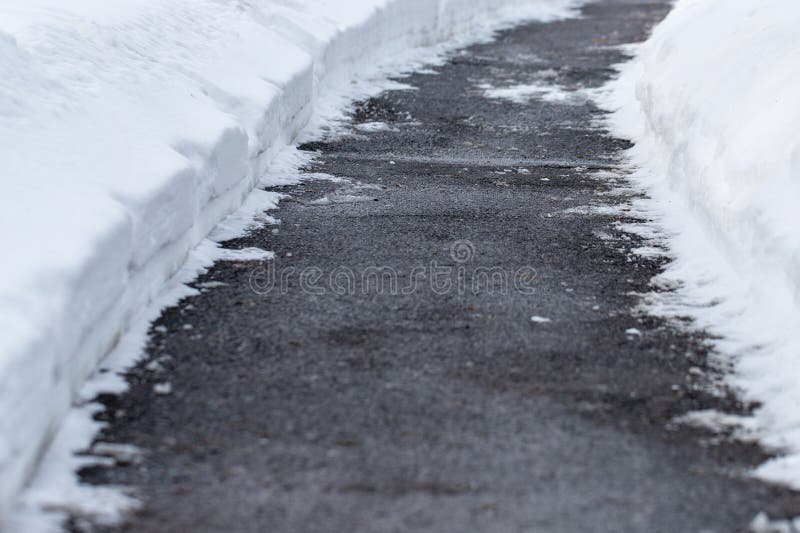 Winter Road with Salt for Melting Snow Stock Photo - Image of salted ...