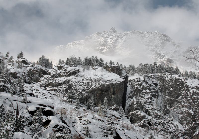 Snow-Covered Rocks stock photo. Image of snow, rocks - 72673798