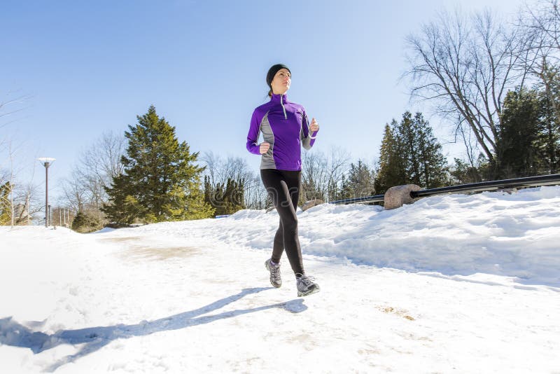 Winter Running Exercise. Runner Jogging in Snow. Stock Photo - Image of ...