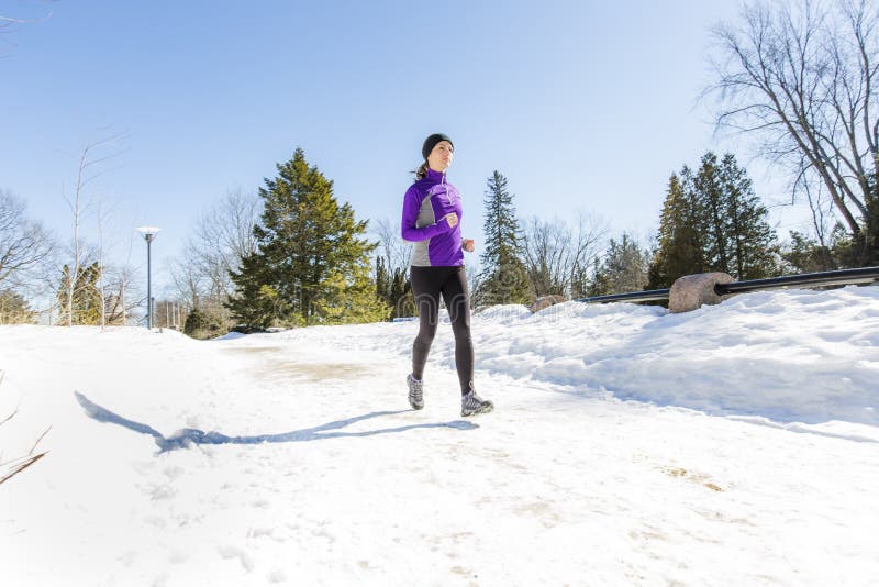 Winter Running Exercise. Runner Jogging in Snow. Stock Photo - Image of ...