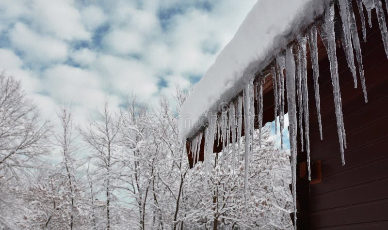 Winter Scene with Icicles stock photo. Image of eave - 48426078