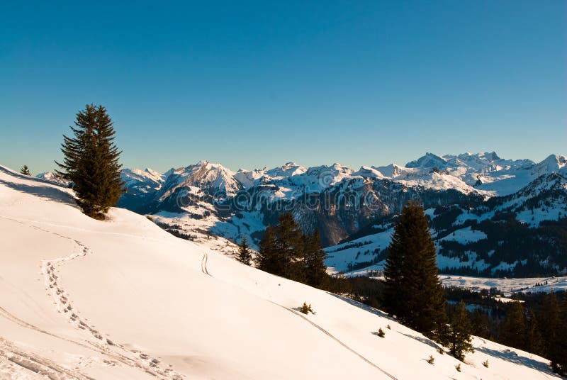 Winter scene in swiss alps stock photo. Image of blue - 8097146
