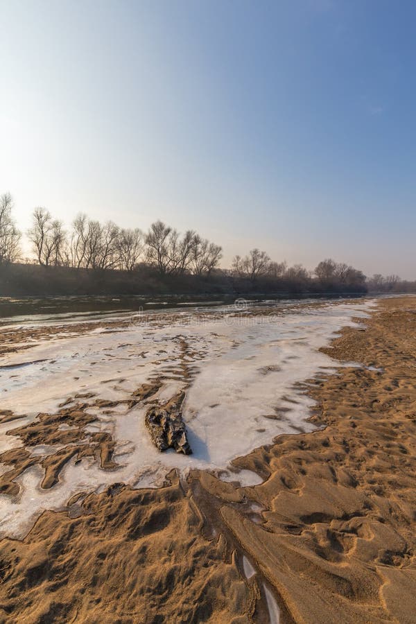 Winter Scenery, with Frozen River and Ice Covered Sand Dunes, on a Cold ...