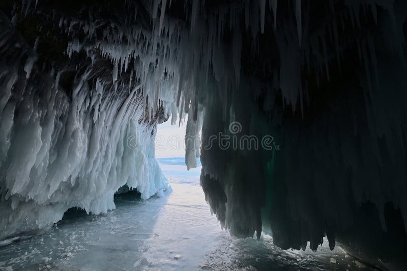 Ice Cave with Crystal Blue Icicles at Lake Baikal Stock Photo - Image ...