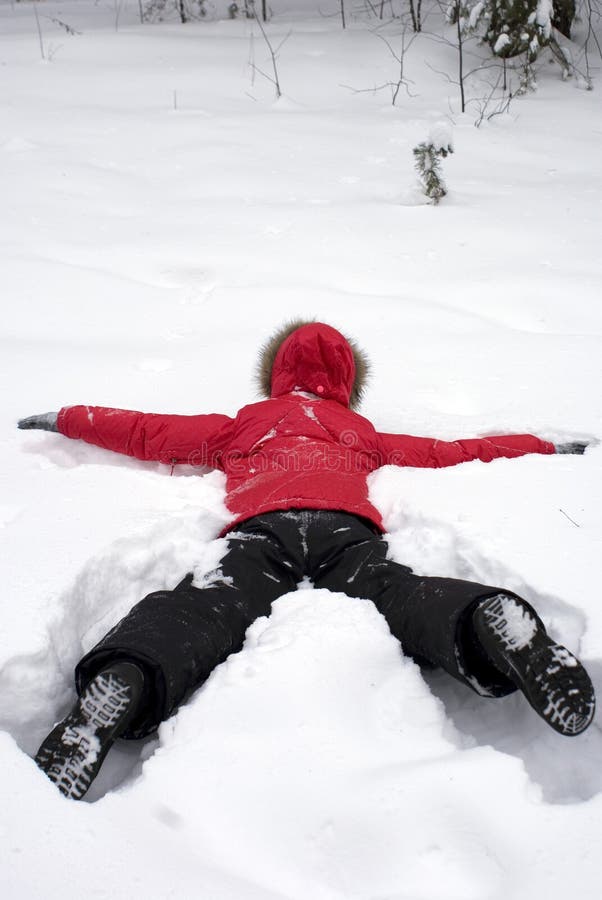 Winter snow angel stock photo. Image of jacket, weather - 8044696