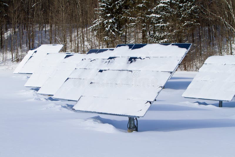 Winter solar panels stock photo. Image of ecologically - 18568016