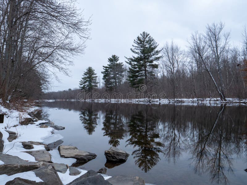 Winter Stream Scene stock image. Image of snow, rocks - 327220379