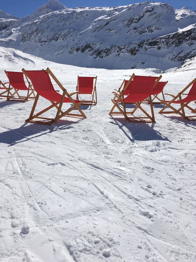 Winter sunbathing stock photo. Image of mountain, winter - 100639516