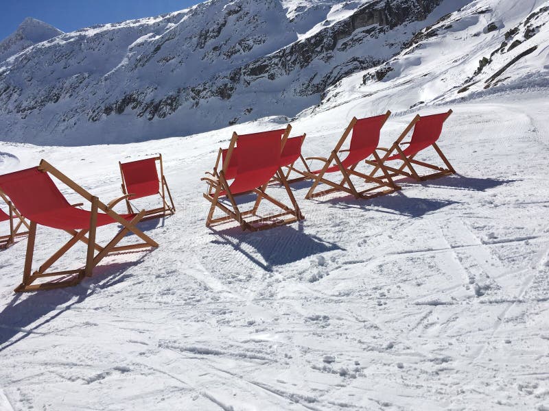 Winter sunbathing stock photo. Image of seasonal, loungers - 94850272