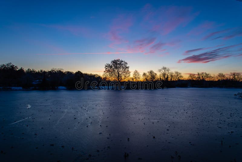 Winter Sunrise Over the Frozen Huron River Stock Image - Image of ...