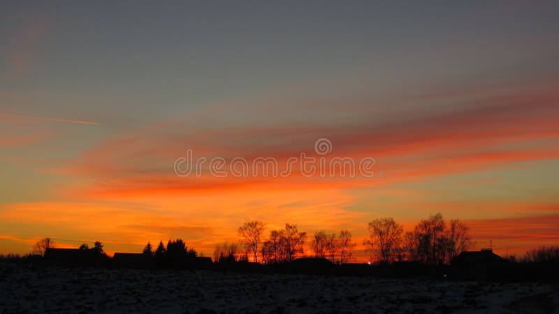 Winter Sunset and House Roofs Stock Photo - Image of countryside, tree ...