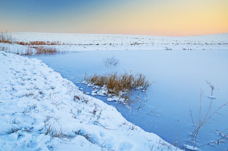 Winter Sunset Over Frozen Pond Stock Image - Image of countryside ...