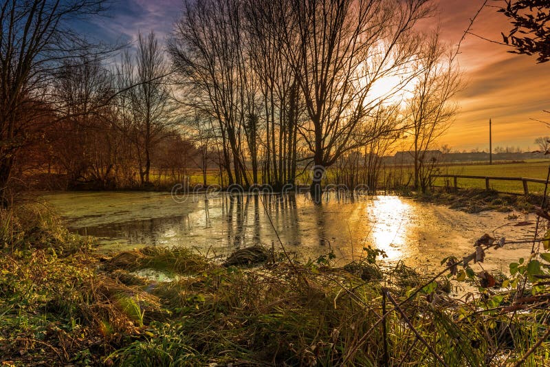 Winter sunset on pond stock photo. Image of country, sunset - 28645536