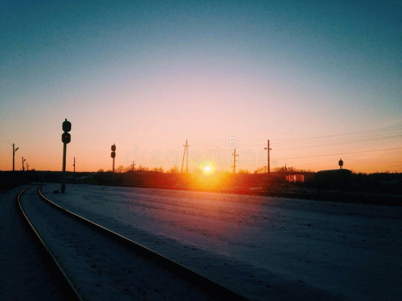 Winter sunset in railway stock photo. Image of snow, winter - 50974548