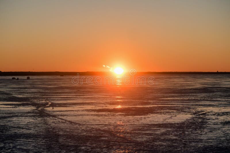 Winter sunset on the sea stock image. Image of nature - 275776749