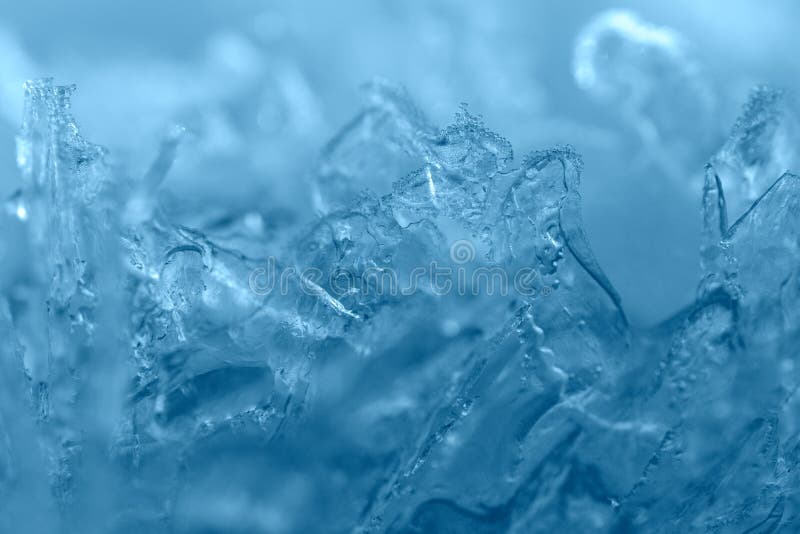 Winter Theme Background with Frozen Blue Ice Splashes in it Stock Image ...