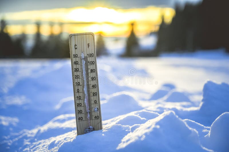 Thermometer on Snow Shows Low Temperatures - Zero. Low Temperatures in ...