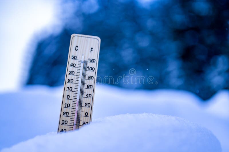Winter Time. Thermometer on Snow Shows Low Temperatures in Celsius ...