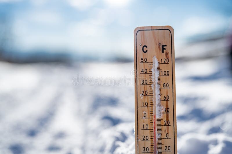 Winter Time. Thermometer on Snow Shows Low Temperatures in Celsius ...