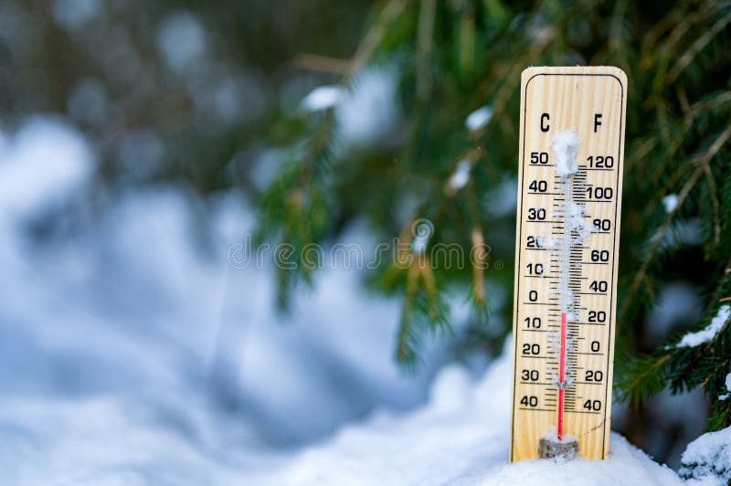 Winter Time. Thermometer on Snow Shows Low Temperatures in Celsius ...