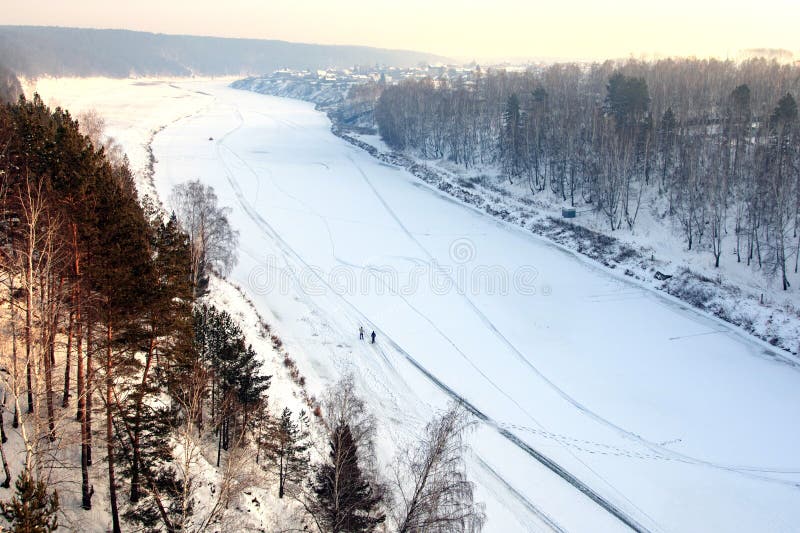 Winter Time View from the Height of the Frozen River, Two People on the ...