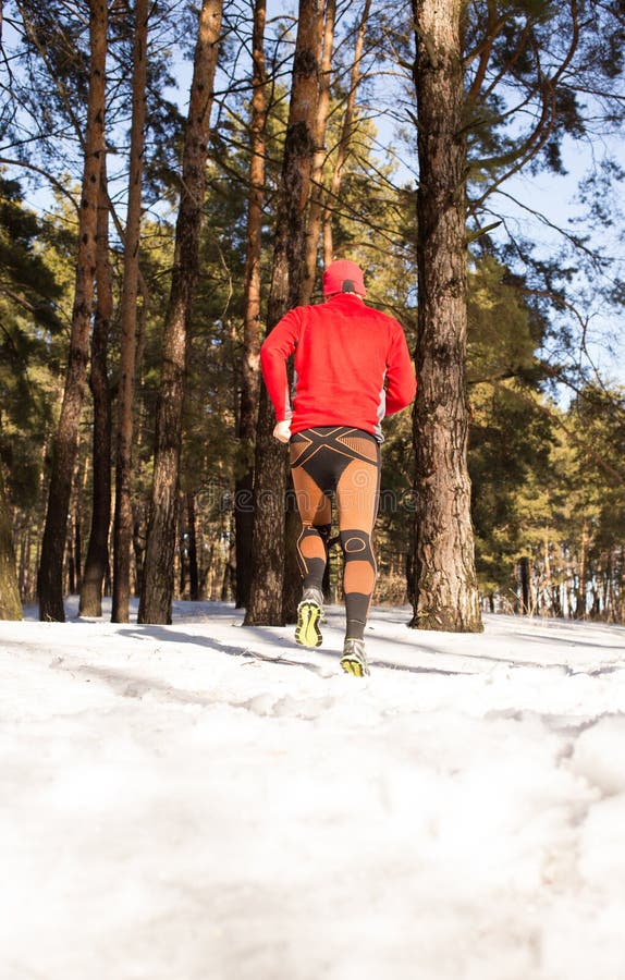Winter trail running stock image. Image of male, exercise - 65926327