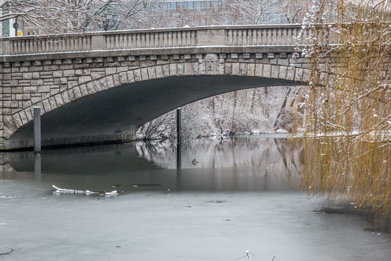 Winter View of a Frozen River Under a Bridge Stock Image - Image of ...
