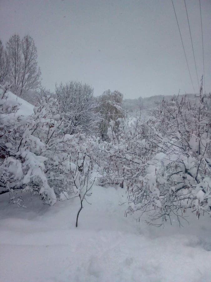 Winter in village in march stock image. Image of snow - 178451557