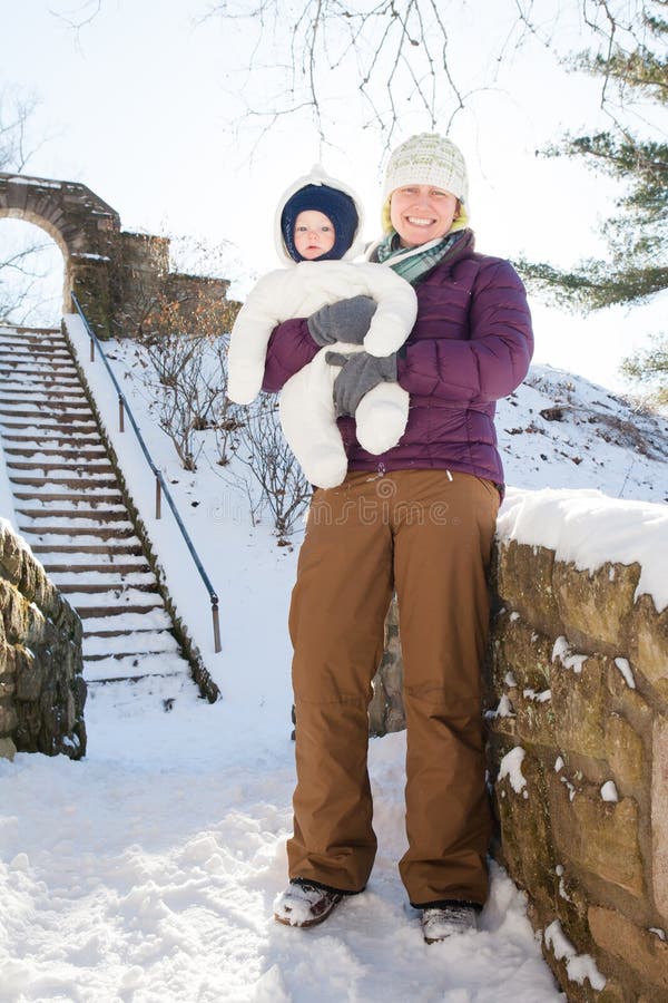 Winter Walk in the Snow with Mom Stock Image - Image of clothing ...