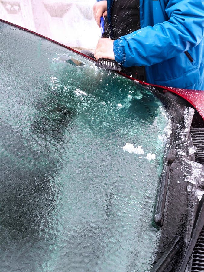 Winter Weather Icy Conditions, Scrape Ice from Car Windshield. Stock ...