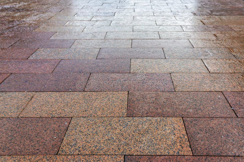 Winter Wet Square Tile Pavement in City Square after Rain Stock Image ...