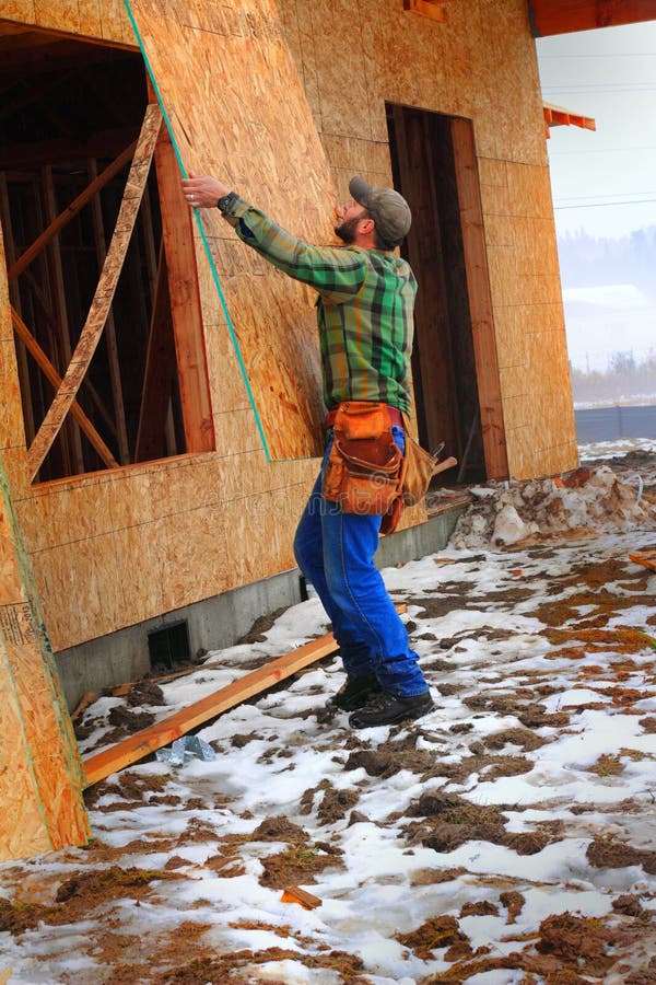 Winter Work stock image. Image of cold, house, lifting - 37889949