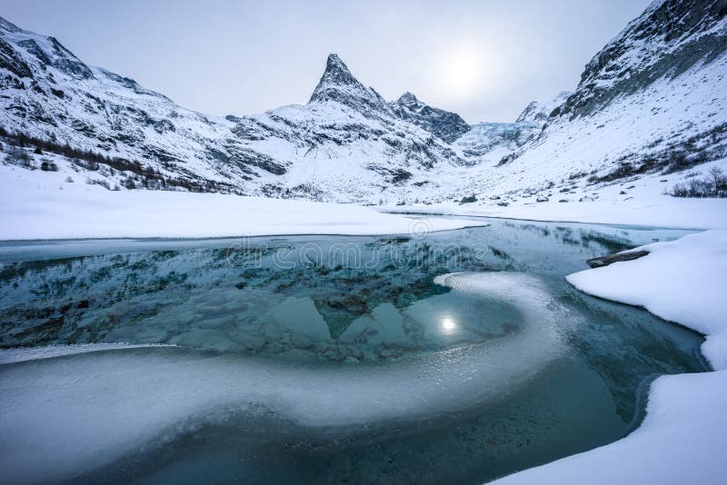 Wintry Landscape of the Mont Mine Covered by Snow, with a Rounded Shape ...