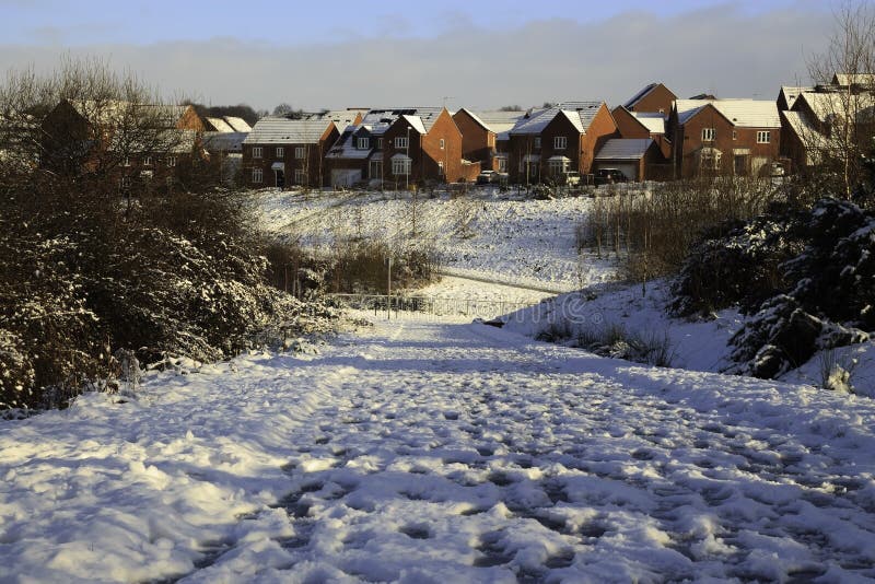 Wintry Scene Over a Walkway Stock Photo - Image of covered, houses ...