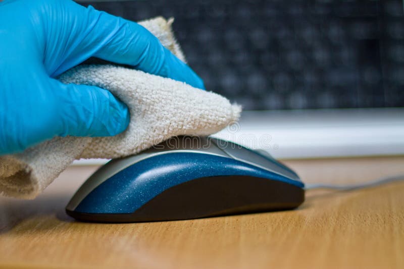 Wipe with Antibacterial Wipe on the Surface of a Computer Mouse ...