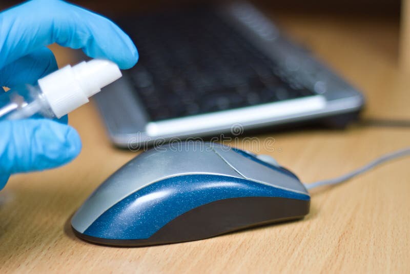 Wipe with Antibacterial Wipe on the Surface of a Computer Mouse ...