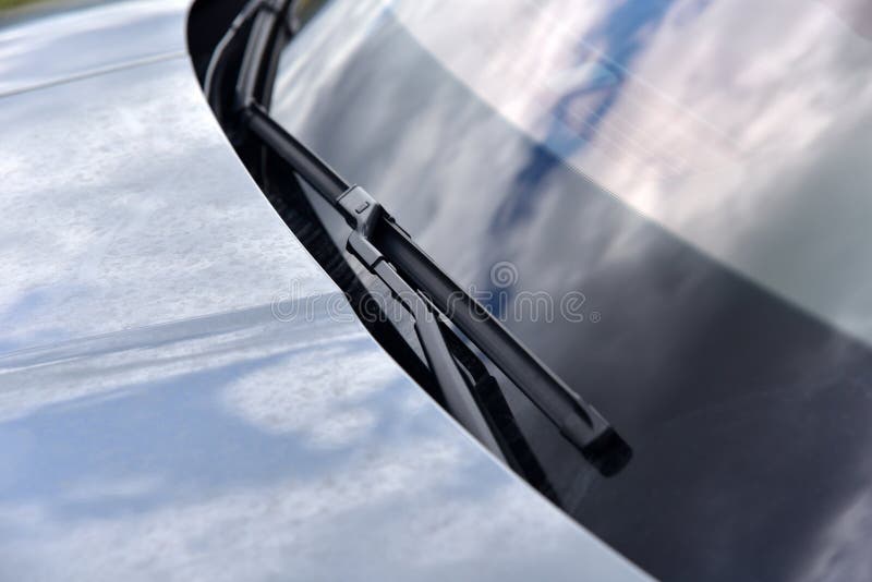 Wiper on the Front Windshield of a Passenger Car Stock Photo - Image of ...