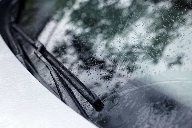 Wipers Cleaning Raindrops from Car Windshield Outdoors Stock Photo ...