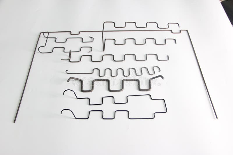 Wire bending forming parts stock image. Image of large - 127955441