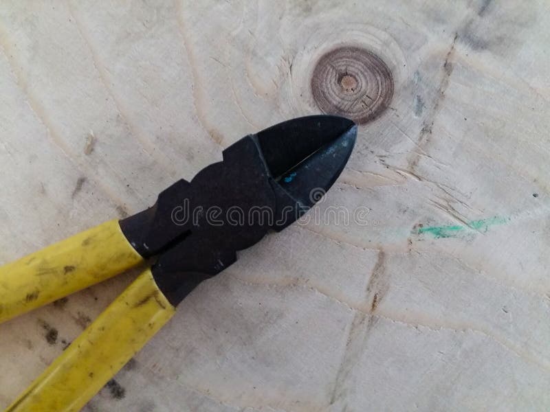 Wire Cutter on the Wood Table Stock Image - Image of wood, wooden ...