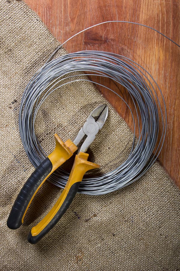 Wire cutters and wire stock photo. Image of cutting - 166248536