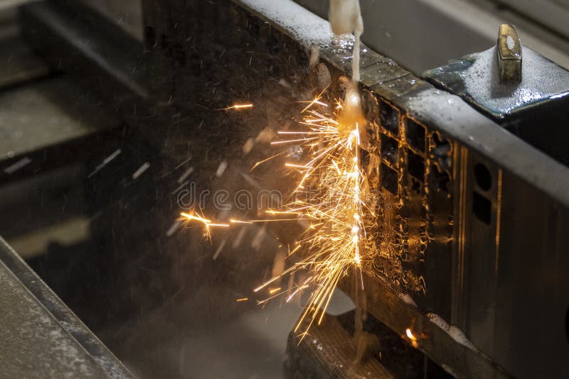 The Wire EDM Machine Cutting the Insert Mold Parts. Stock Image - Image ...