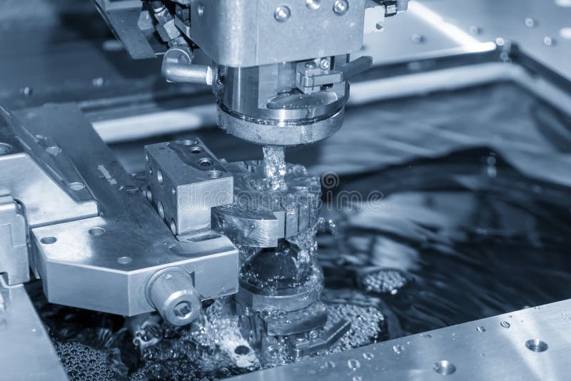 The Wire EDM Machine Cutting the Insert Mold Parts Stock Photo - Image ...